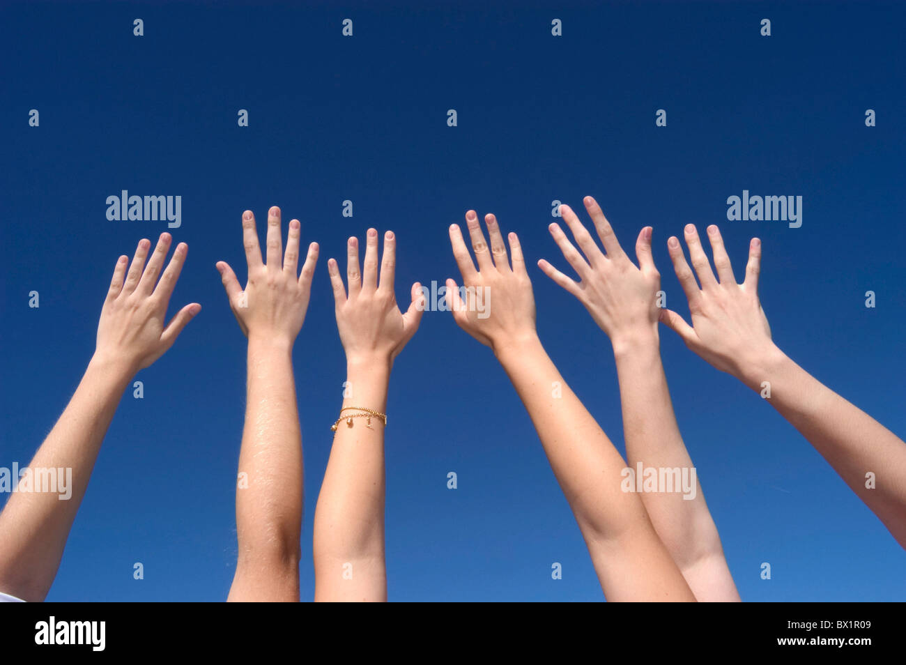 Arms hands hold up holding up sky stretch symbol teenagers three girls ...