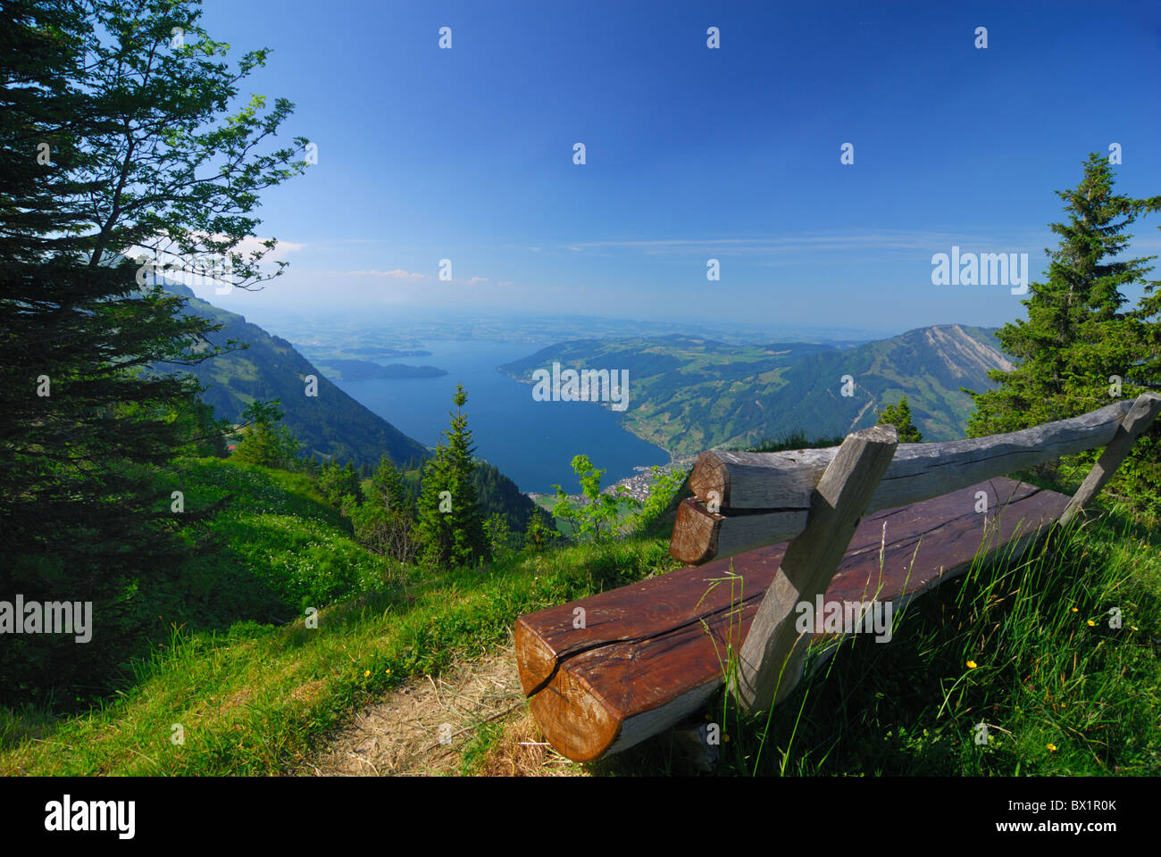 A bench in the Swiss Alps Stock Photo - Alamy