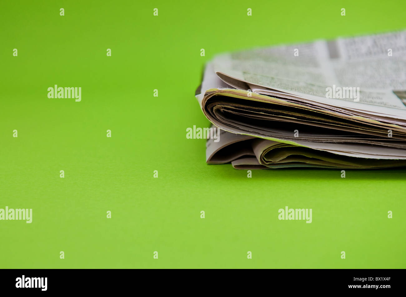 Folded newspaper, close up image Stock Photo - Alamy