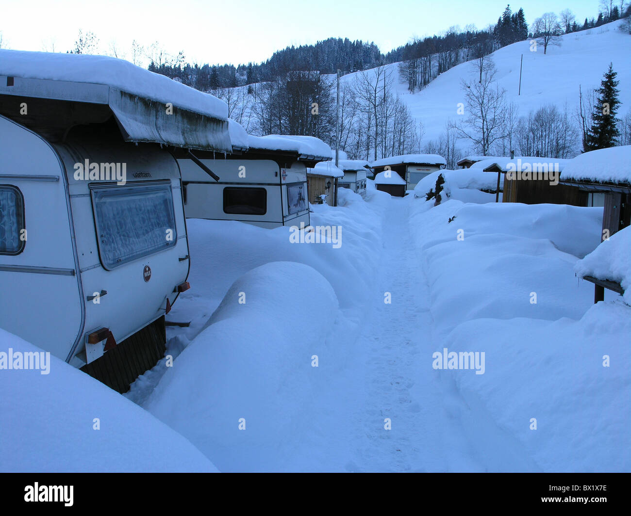 bungalow camping caravan snow tent place tent Winter Stock Photo - Alamy