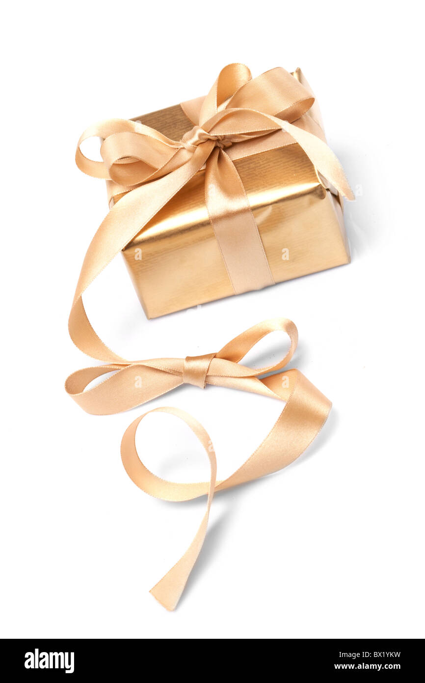 Beautiful golden gift Stock Photo - Alamy