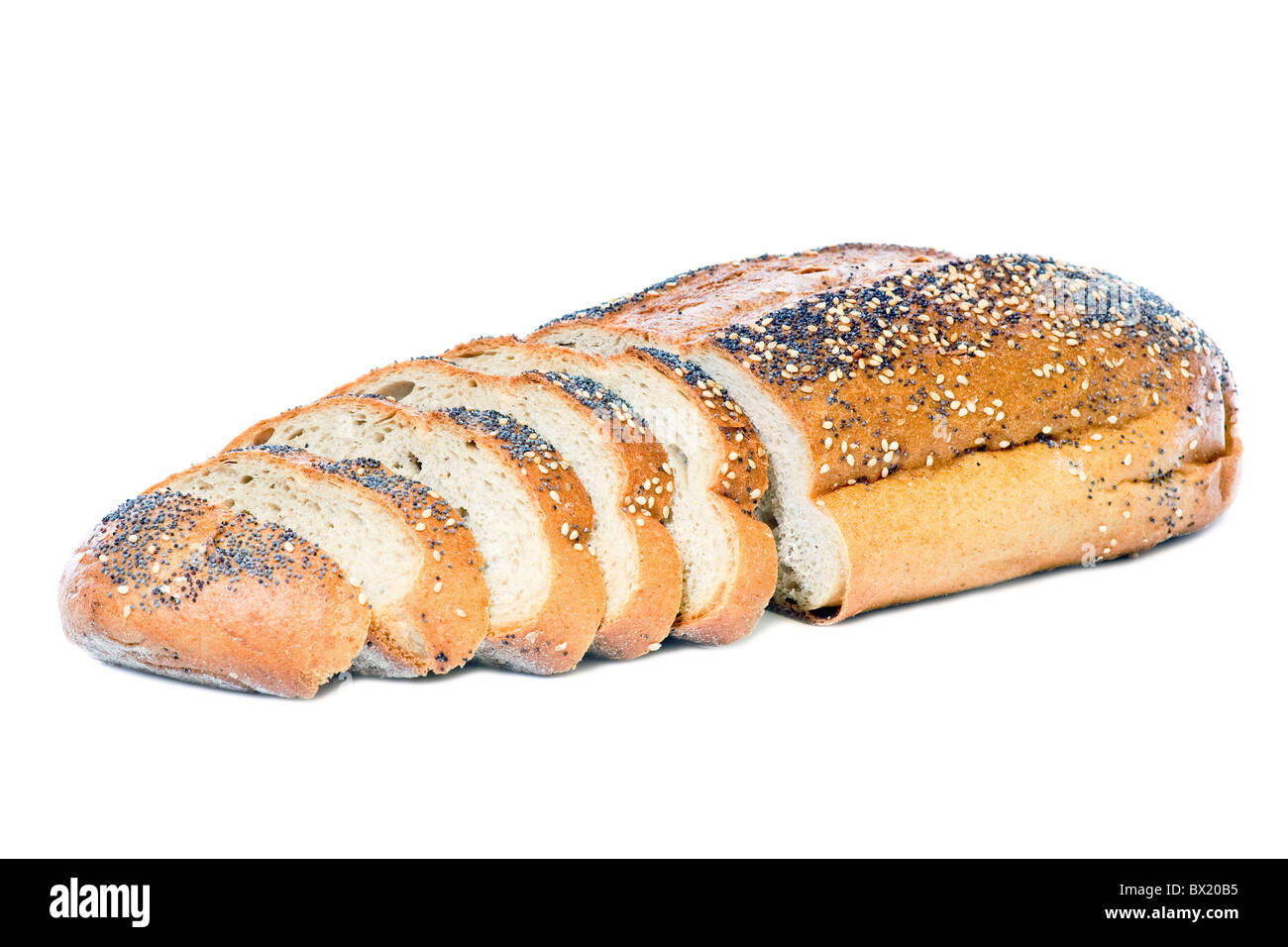 loaf and slices of whole wheat bread isolated on white background Stock ...