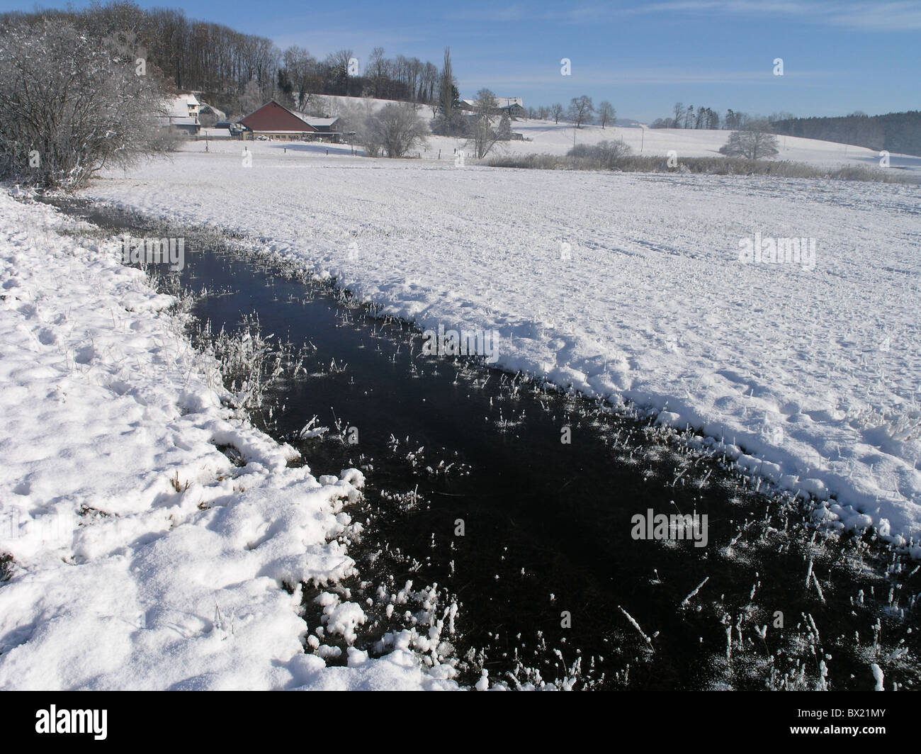brook stream fields scenery landscape snow Winter Stock Photo - Alamy