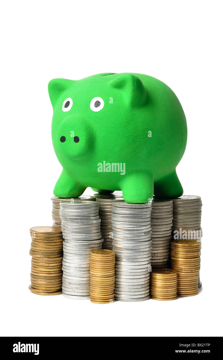 Green Piggy Bank and Coins Stock Photo - Alamy