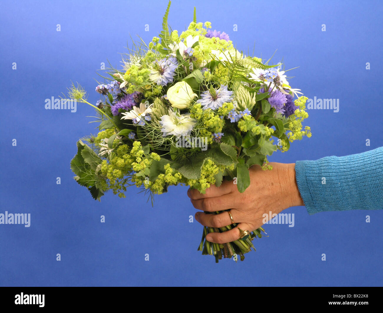 bouquet detail flowers hand Person symbol Stock Photo - Alamy
