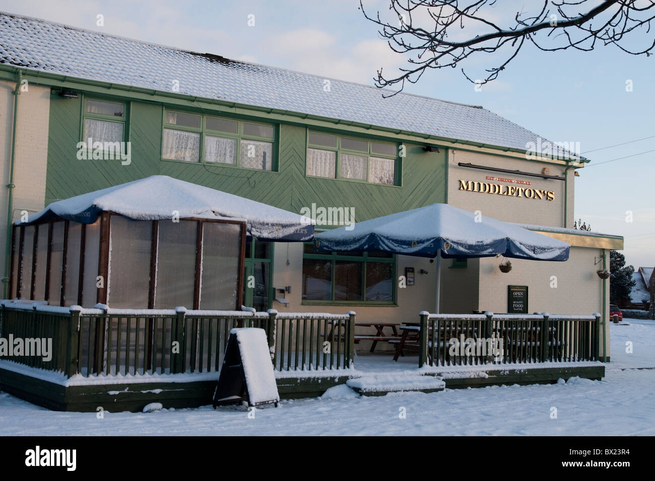 An English pub called The Middletons, closed due to bad weather Stock ...