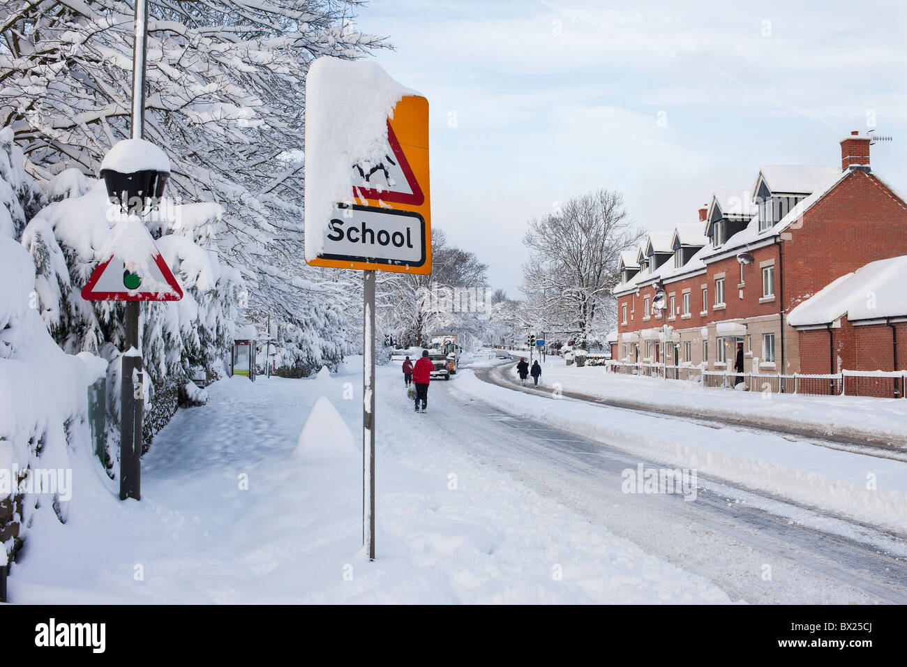 School Children's crossing warning sign in deep heavy snow Stock Photo ...