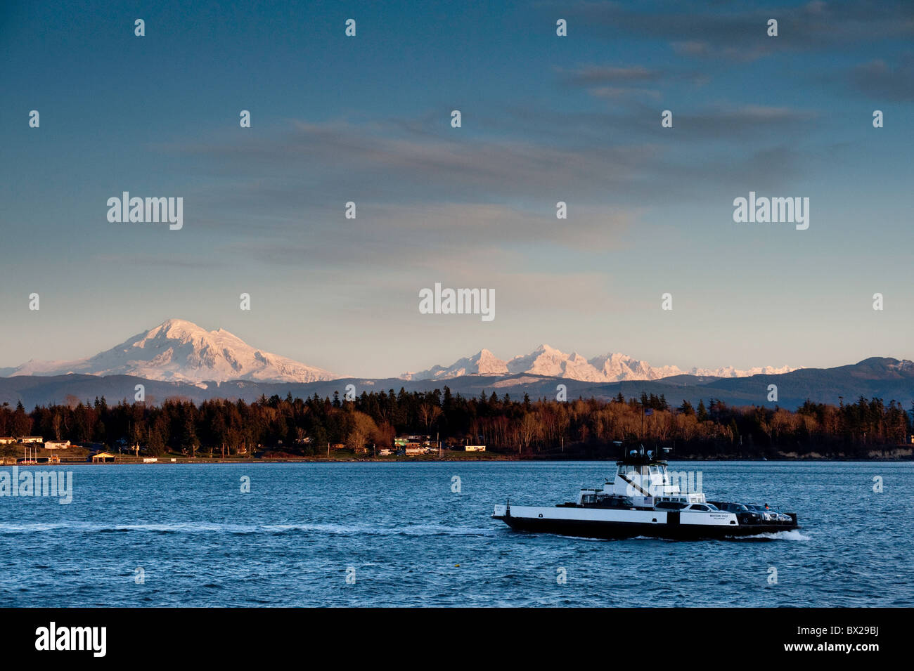The small Lummi island ferry motors from Gooseberry Point acroos Hales ...
