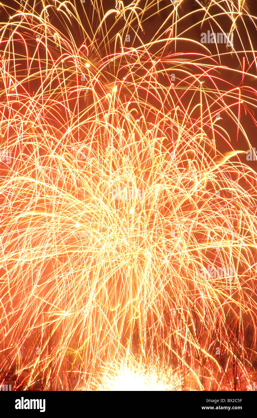 Fireworks Vertical bright yellow orange Stock Photo - Alamy