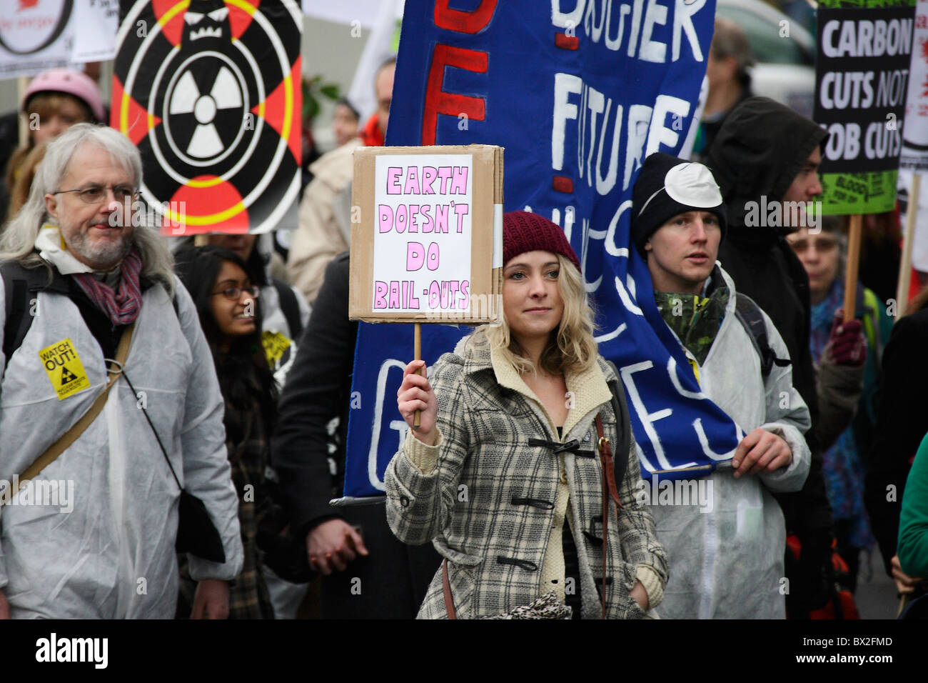 Female climate change protester with placard in London Stock Photo - Alamy