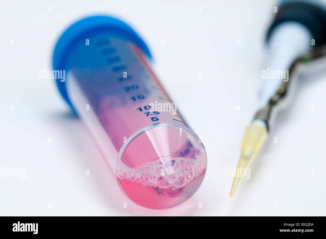A research tube with reagent and pipette on a white background Stock ...