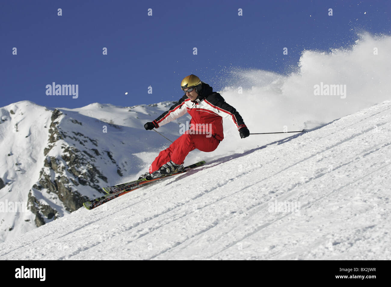 action Carving man model released mountains runway ski skiing snow ...