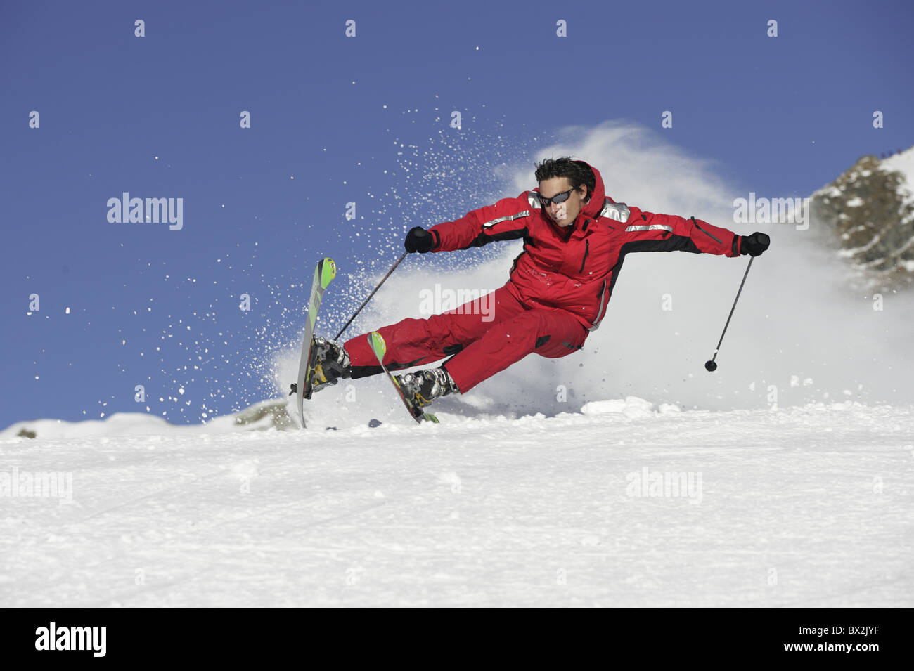 action Carving man model released mountains runway ski skiing snow ...