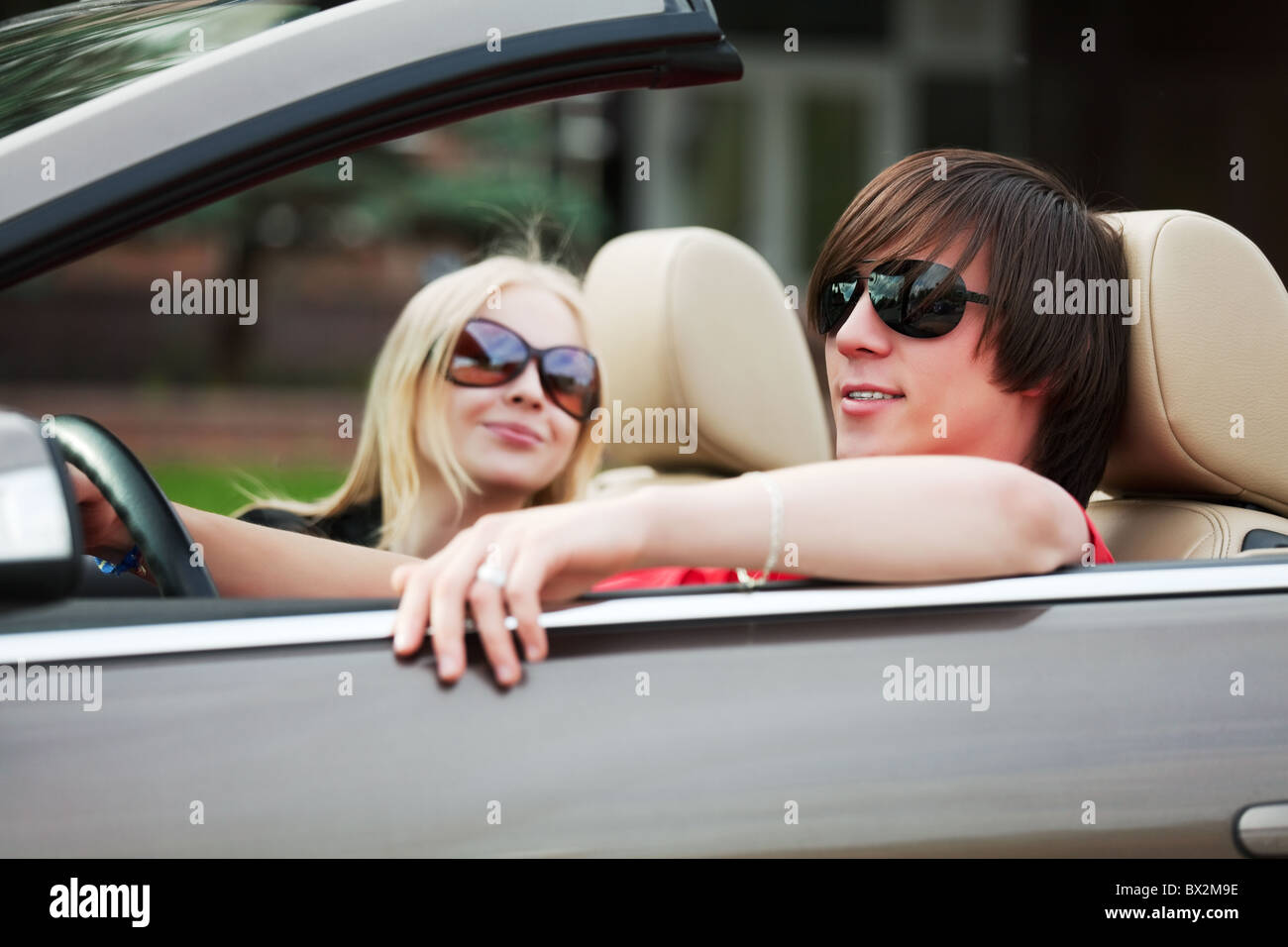 Young couple driving in cabriolet hi-res stock photography and images ...