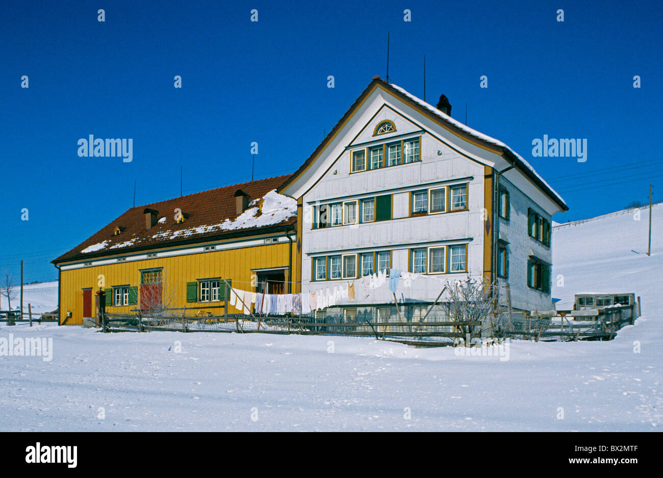 Appenzell farm farmhouse home house snow Switzerland Europe typical ...