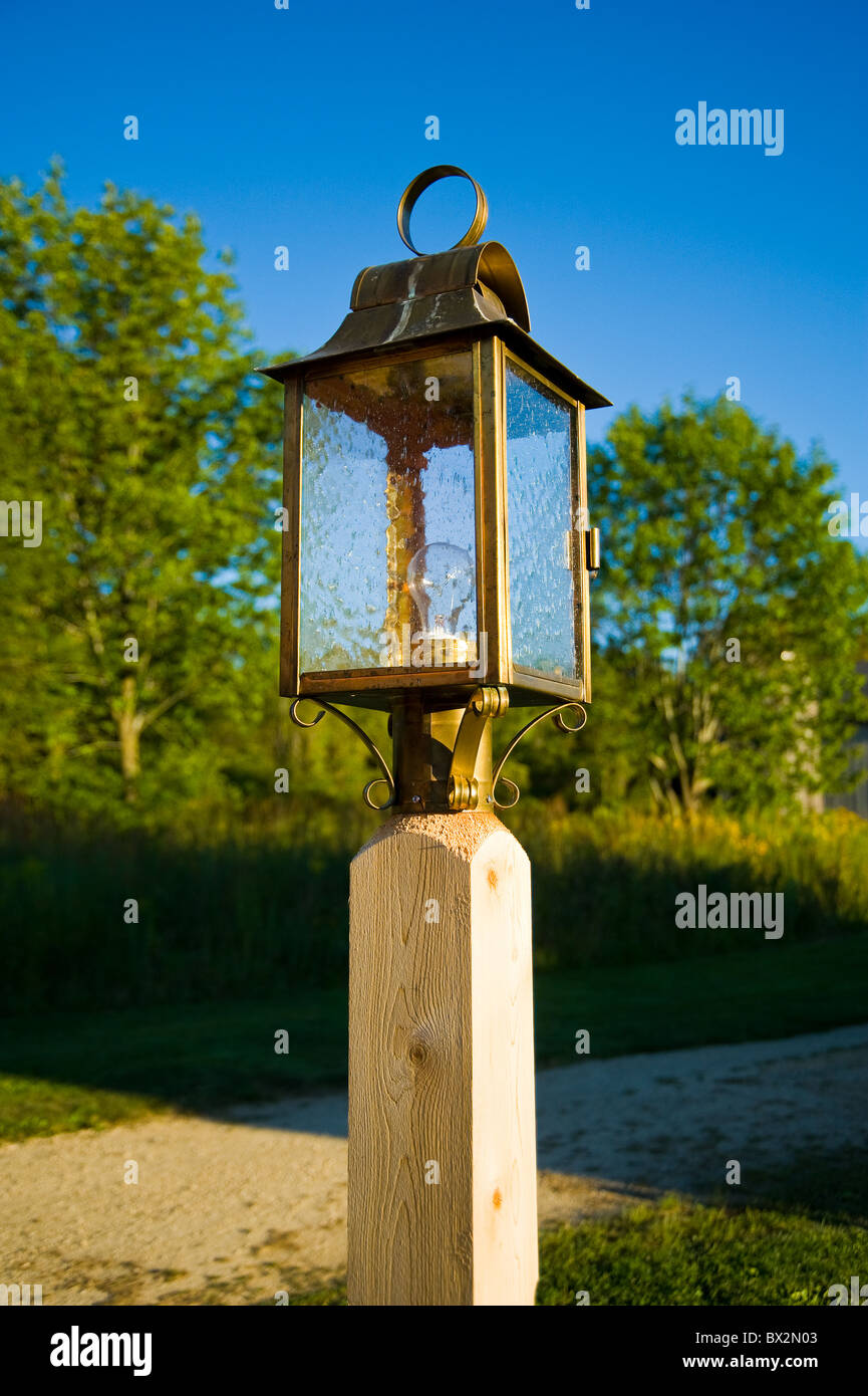 brass outdoor light on post Stock Photo - Alamy