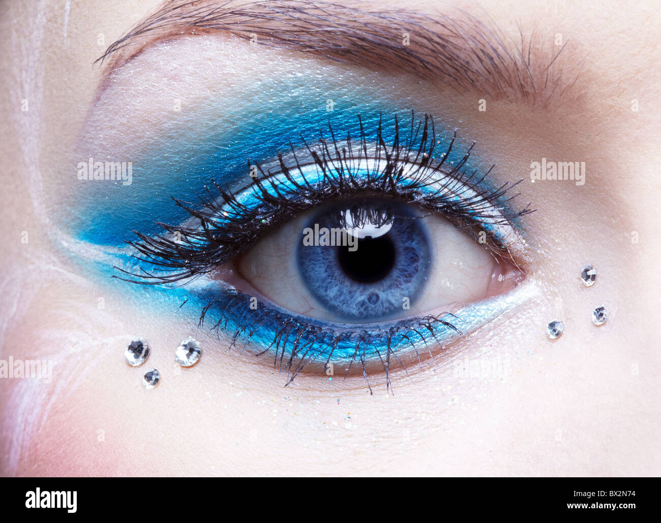 woman eye zone make-up in blue and white tone Stock Photo - Alamy