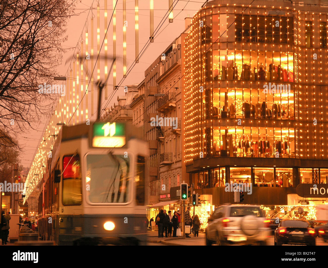Christmas Bahnhofstrasse at night night lighting tram Zurich town city ...