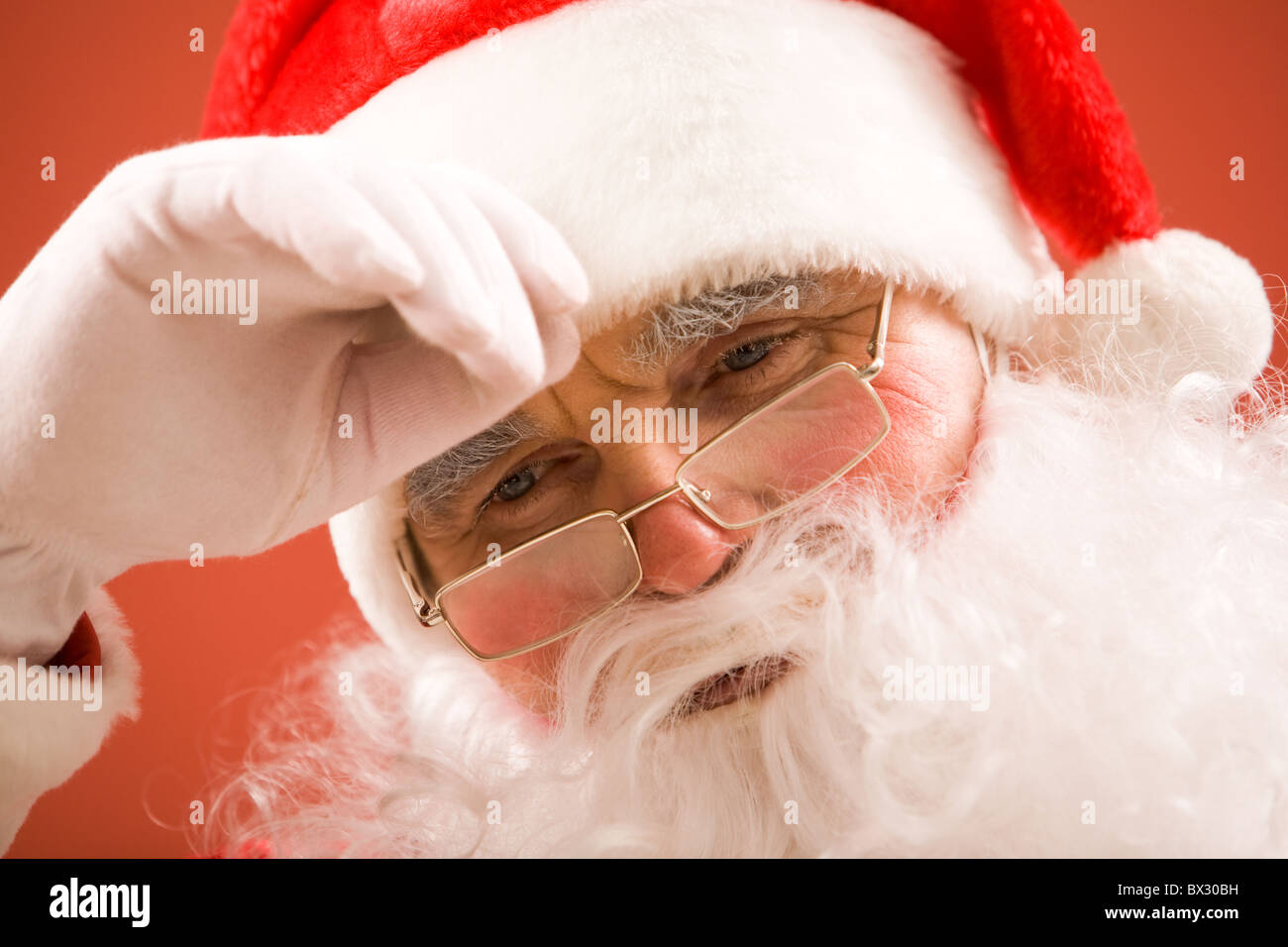 Photo of tired Santa Claus over white background Stock Photo - Alamy