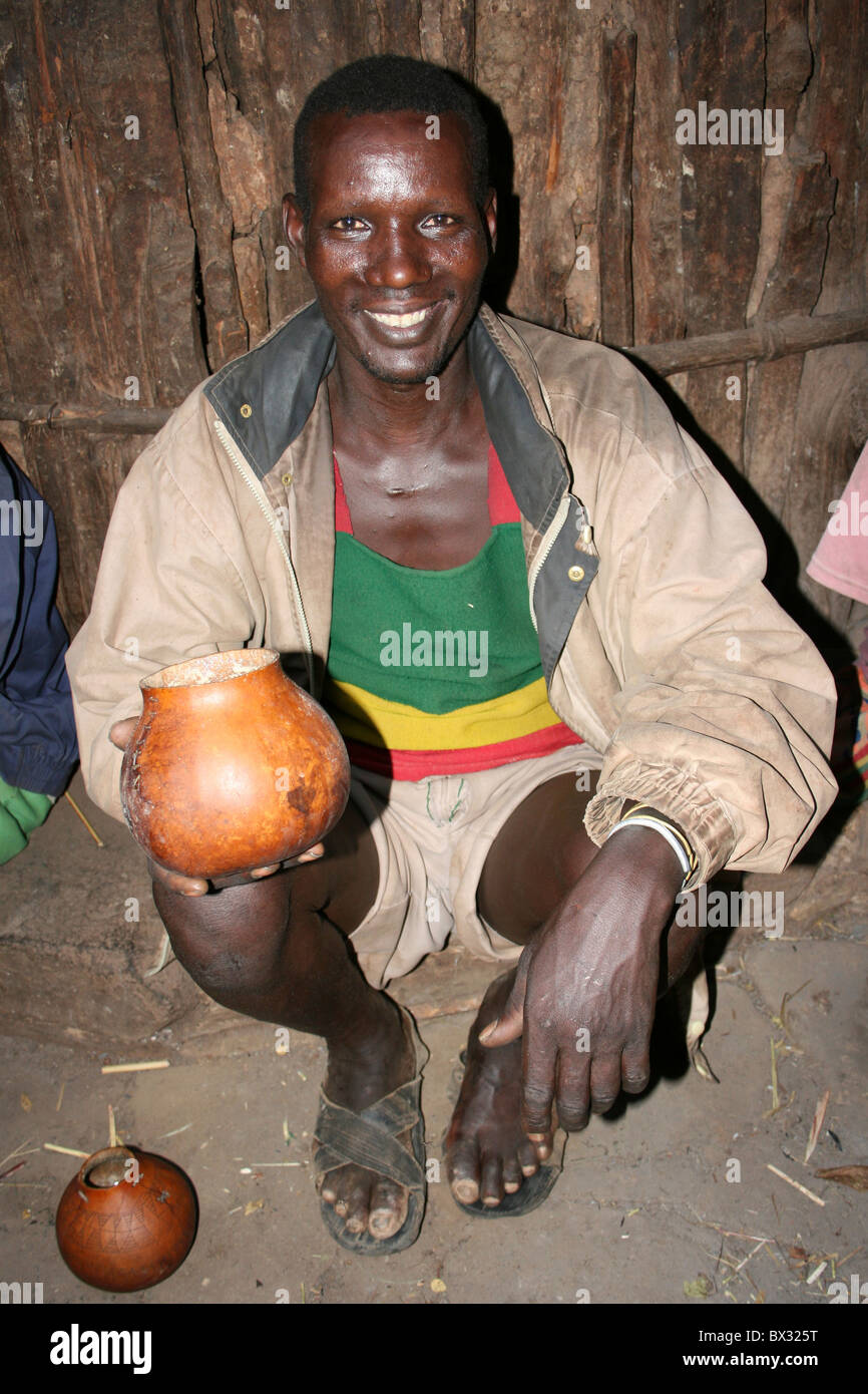 Konso Tribeman Holding Gourd Containing The Local Maize Beer, Ethiopia ...