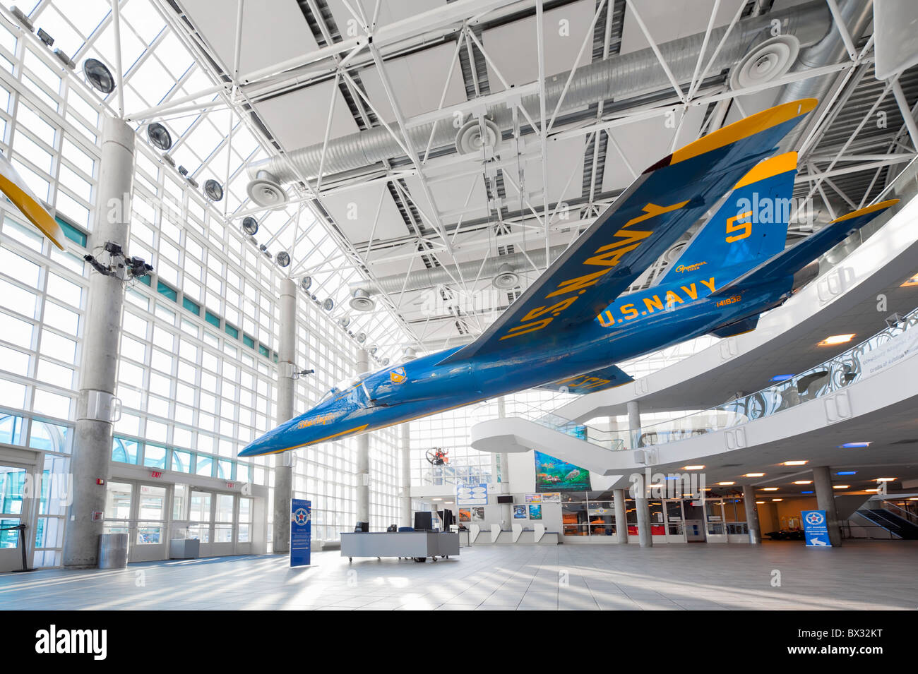 Grumman F11 jet F-11 seen from side suspended from atrium ceiling of ...