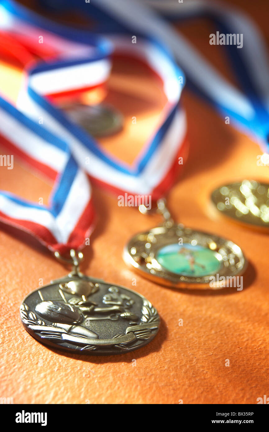 Studio shot of competition medals with ribbons Stock Photo - Alamy