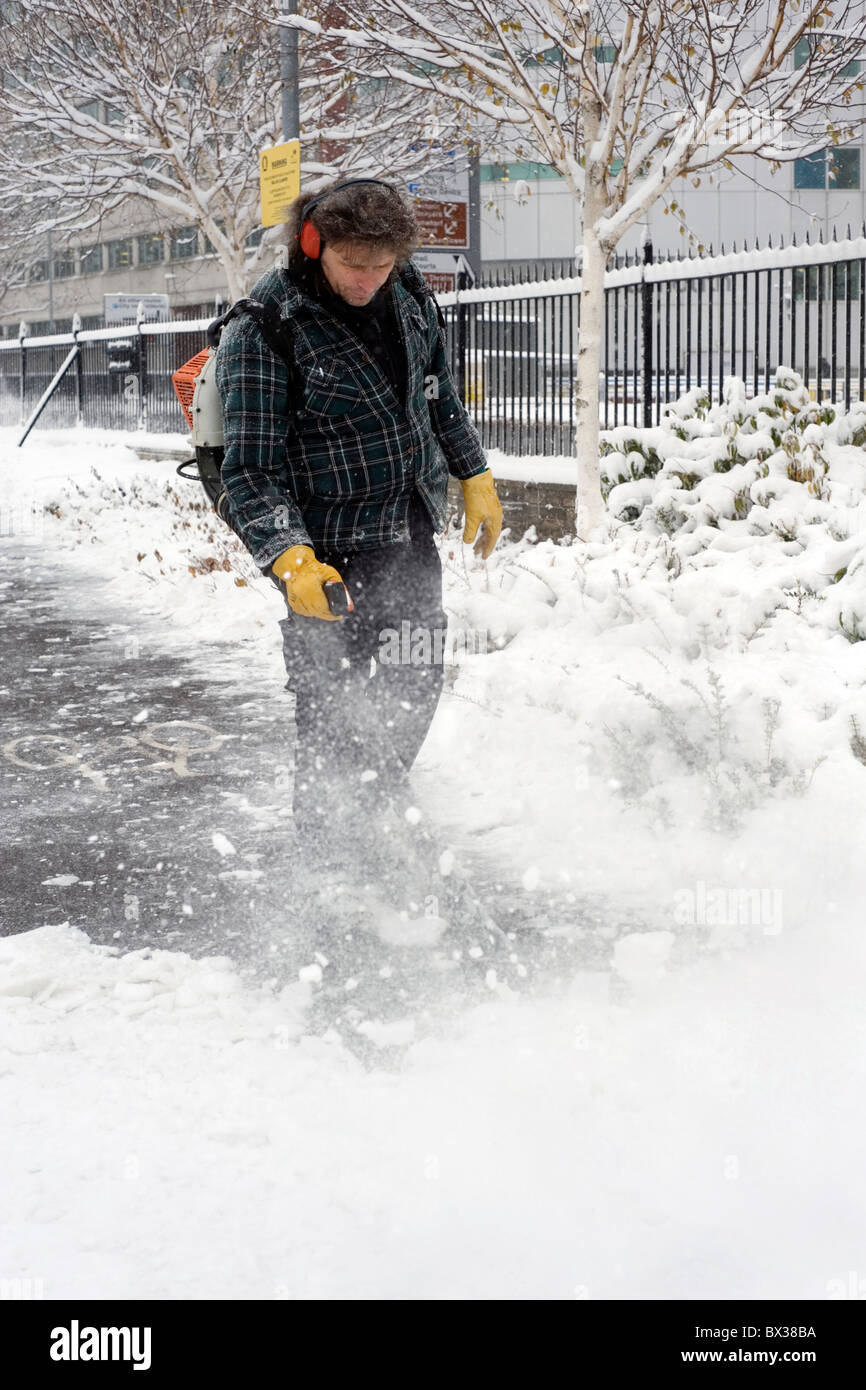 Man using snow blower clear hi-res stock photography and images - Alamy