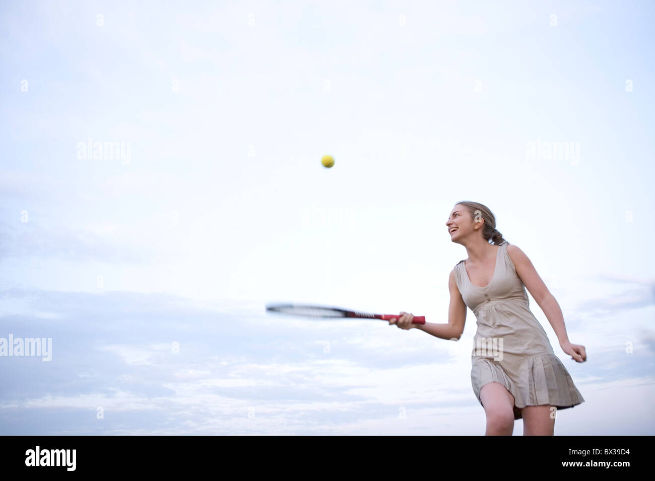 female tennis player balancing ball on racquet Stock Photo - Alamy