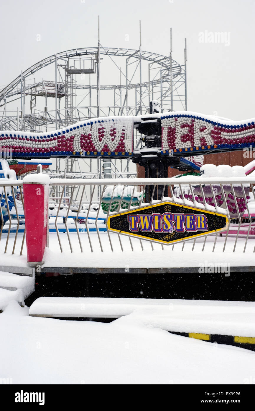 deserted fairground ride under a blanket of fresh snow Stock Photo - Alamy