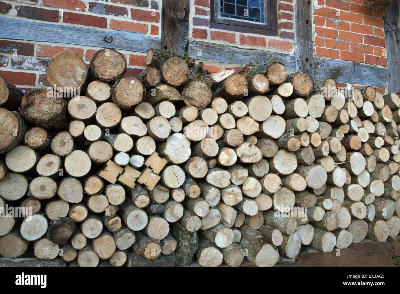 Wood pile against wall logs hi-res stock photography and images - Alamy