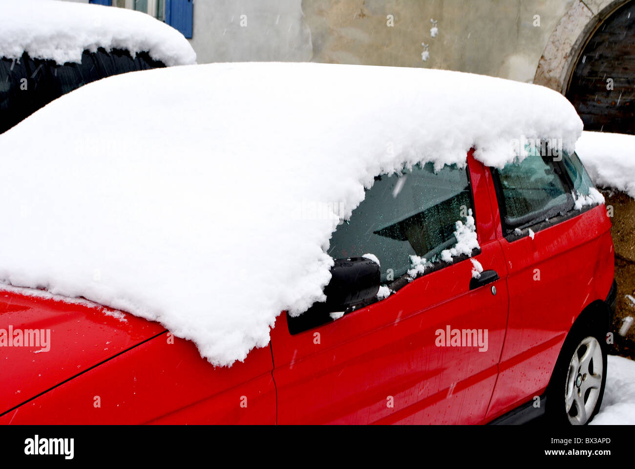 red car with snow Stock Photo - Alamy