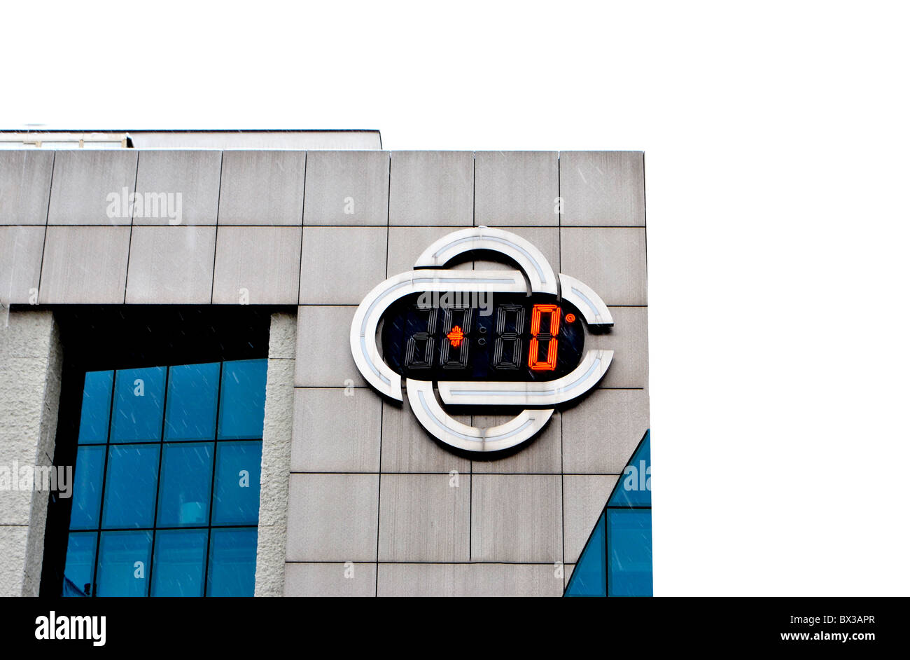red digital clock on modern building Stock Photo - Alamy