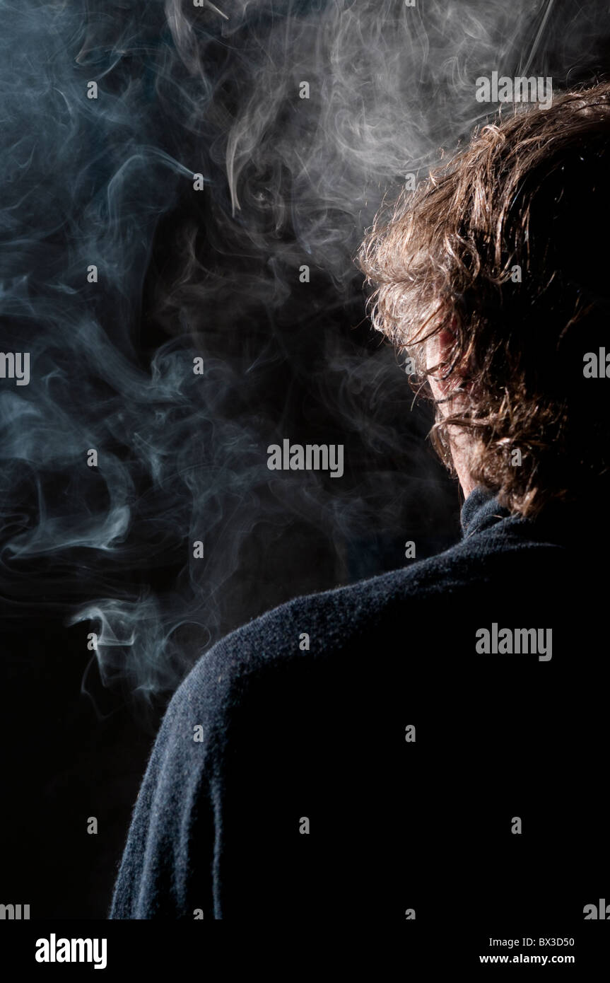 Low key smoking hi-res stock photography and images - Alamy