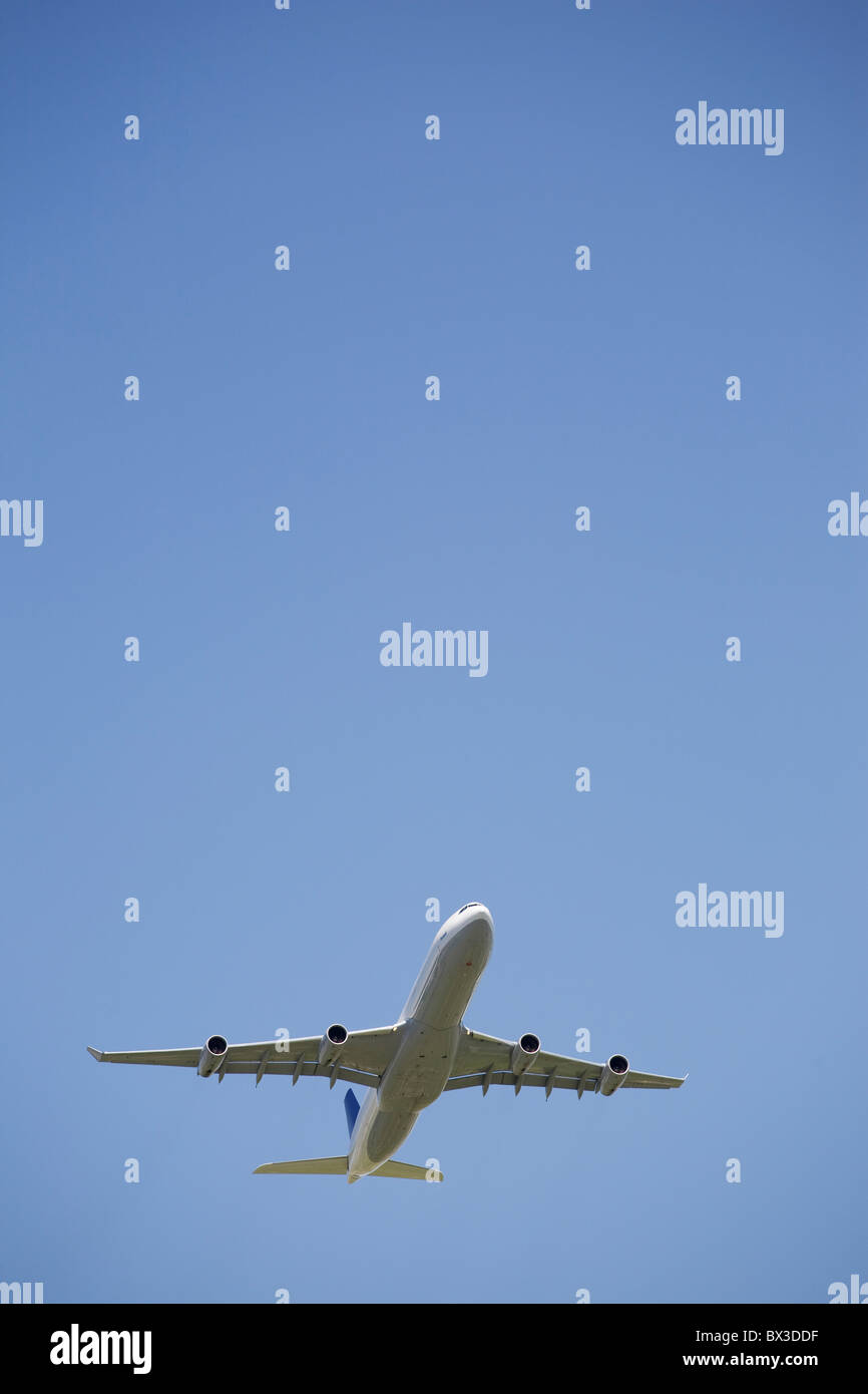 Commercial Airplane In Flight; Calgary, Alberta, Canada Stock Photo - Alamy