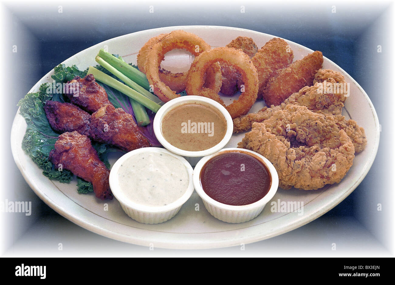 food gastronomy culinary sampler platter spicy chicken buffalo wings ...