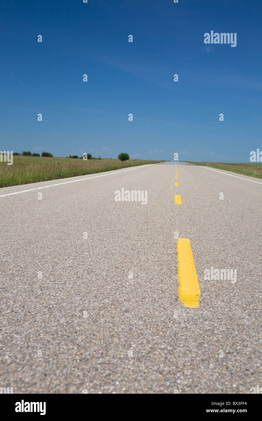 Paved Road With Yellow Stripe Lines; Alberta, Canada Stock Photo - Alamy