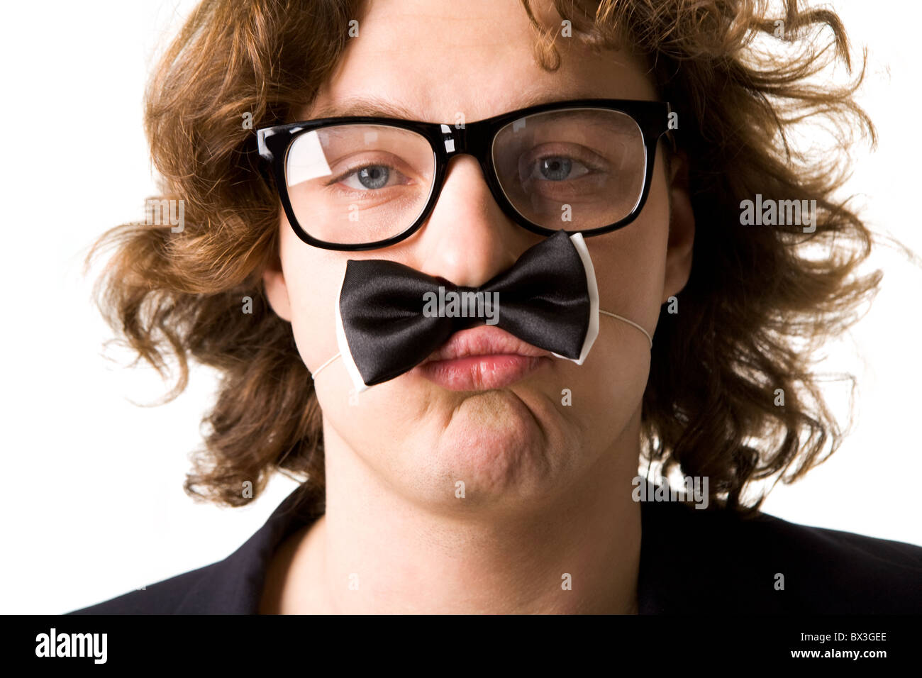 Portrait of man with bowtie between nose and upper lip Stock Photo - Alamy
