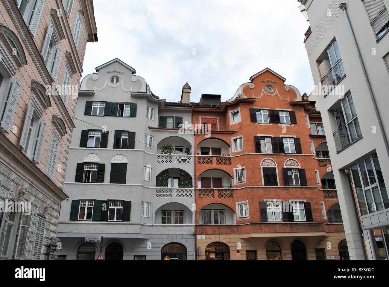 Tyrolean style house with windows and decorations Stock Photo - Alamy