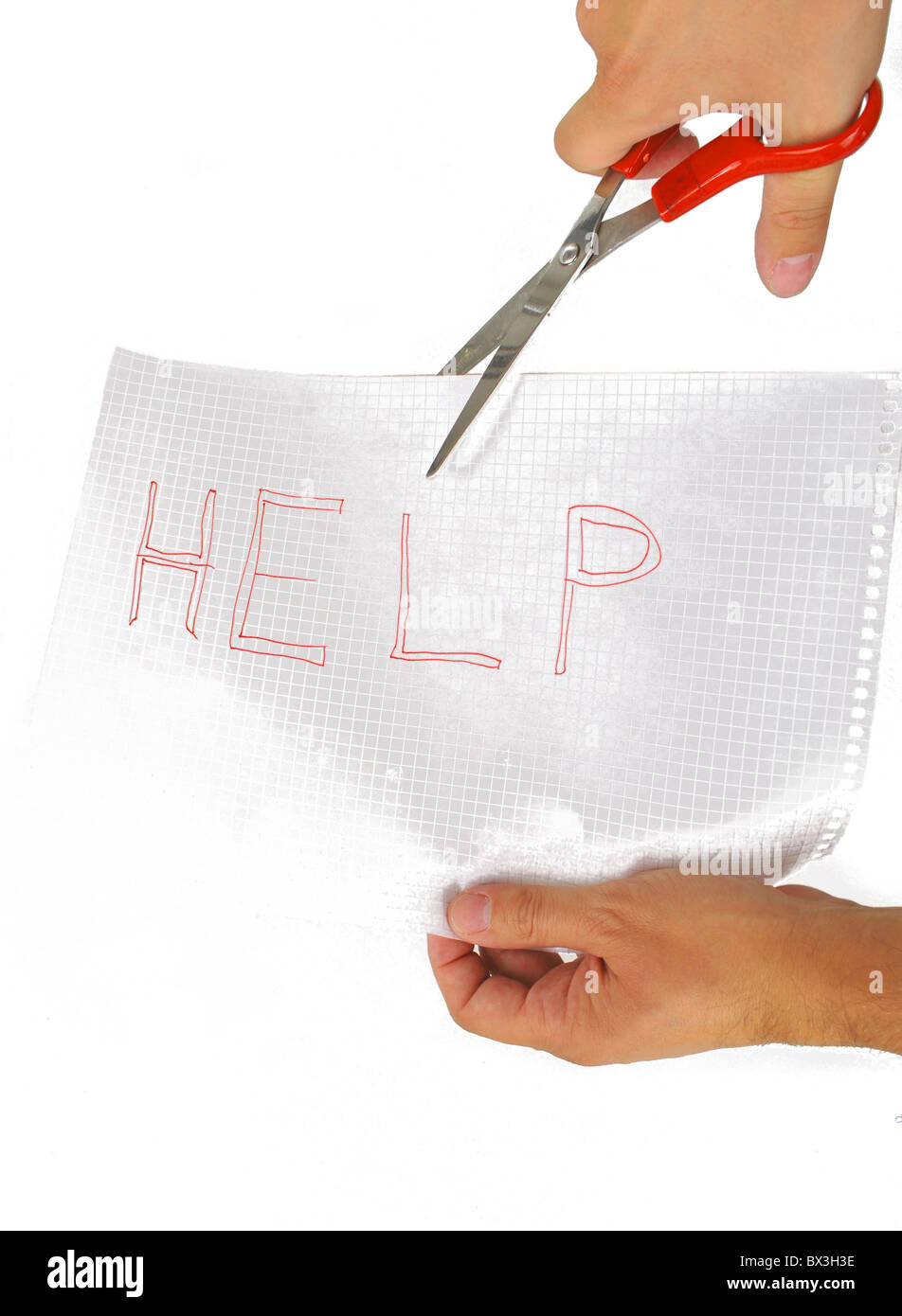 sheet of paper with scissors and writing help Stock Photo - Alamy