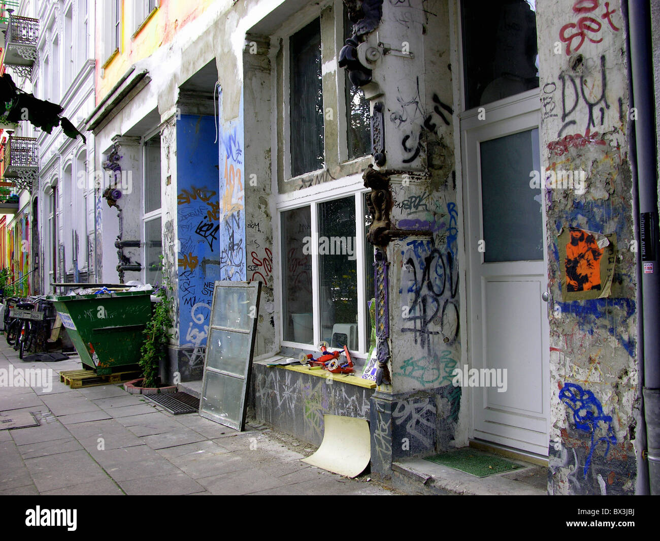 graffiti sprayed damage to property wall spraying Stock Photo - Alamy