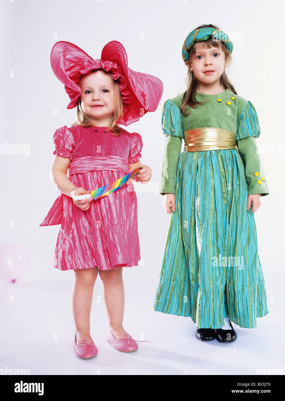 Two girls in the princess disguise indoors Stock Photo - Alamy