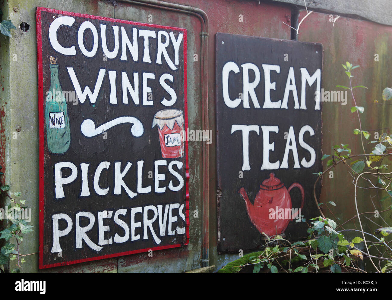 Old painted signs for a traditional English tea shop and a country ...
