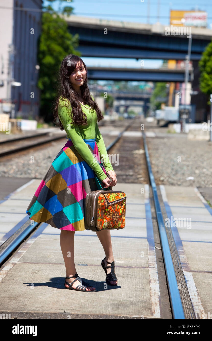 Teenage Girl On The Train Tracks Downtown; Portland, Oregon, United ...
