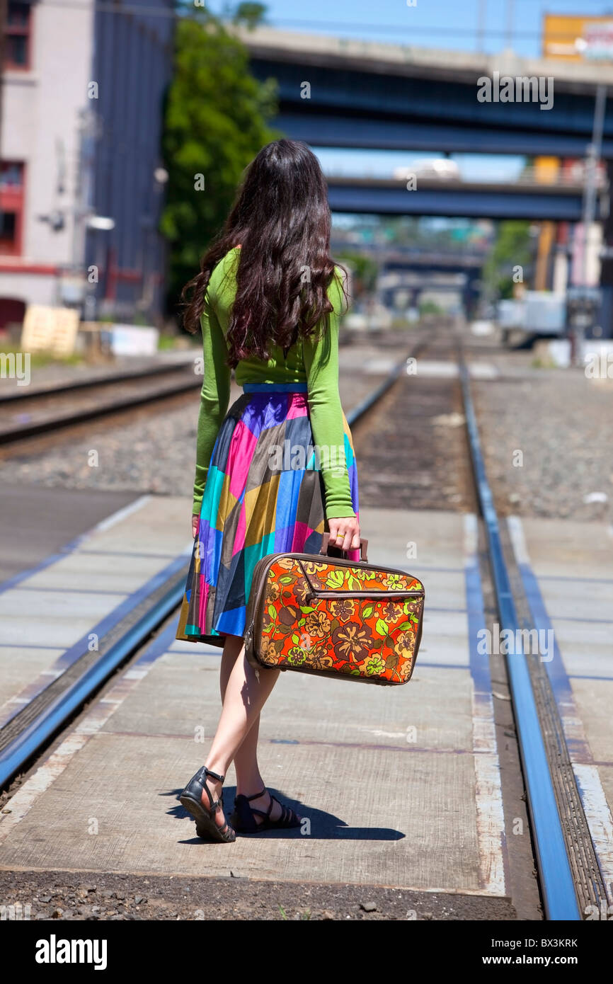 Teenage Girl On The Train Tracks Downtown; Portland, Oregon, United ...