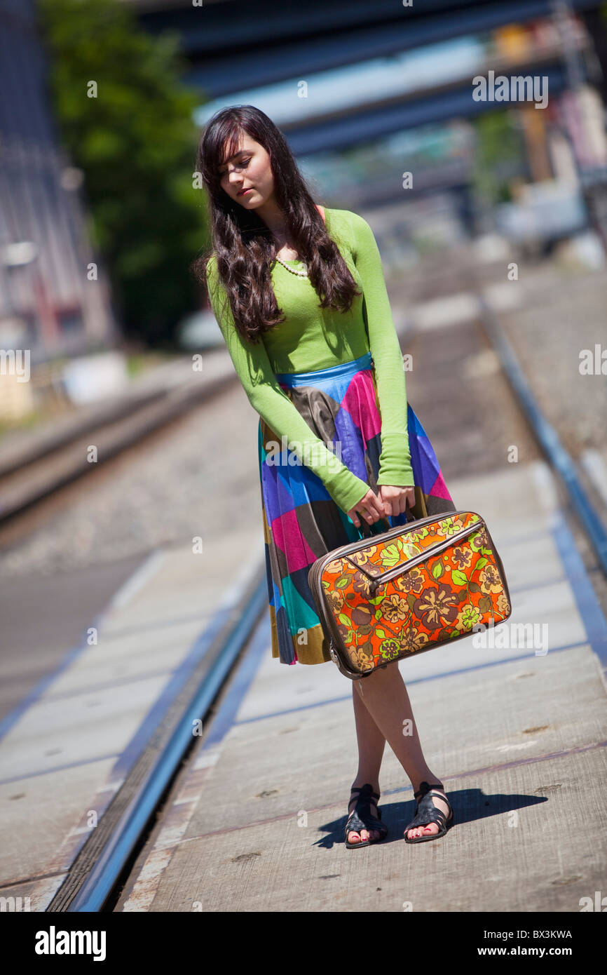 Teenage Girl On The Train Tracks Downtown; Portland, Oregon, United ...