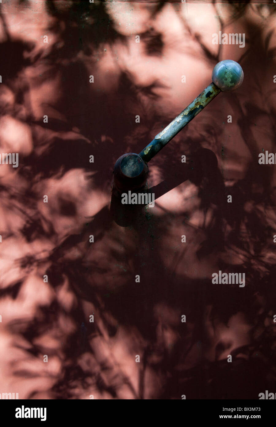 Metallic valve control lever with round knob Stock Photo - Alamy