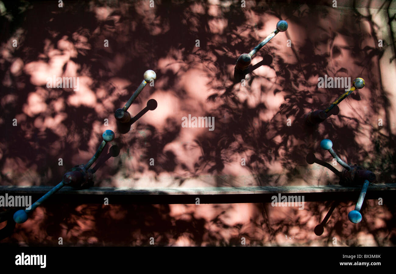 Multiple metallic control levers with round knobs Stock Photo - Alamy