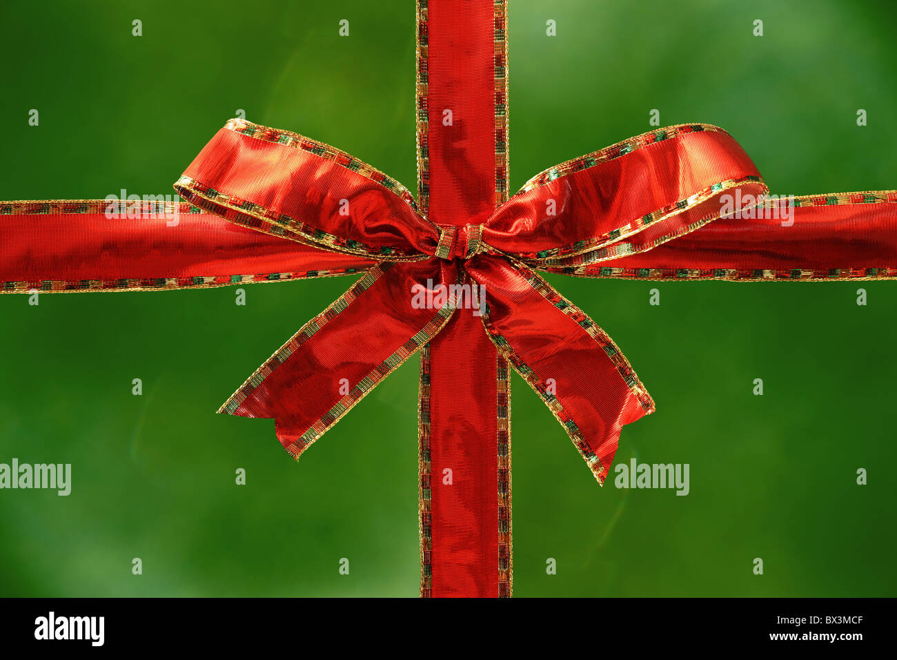 Shiny red bow Stock Photo - Alamy