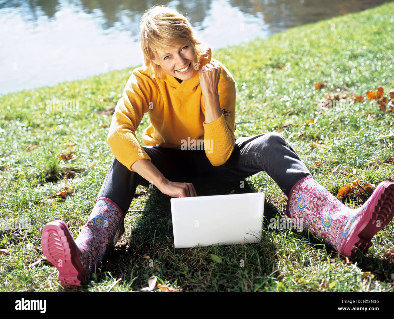 Woman in the park Stock Photo - Alamy