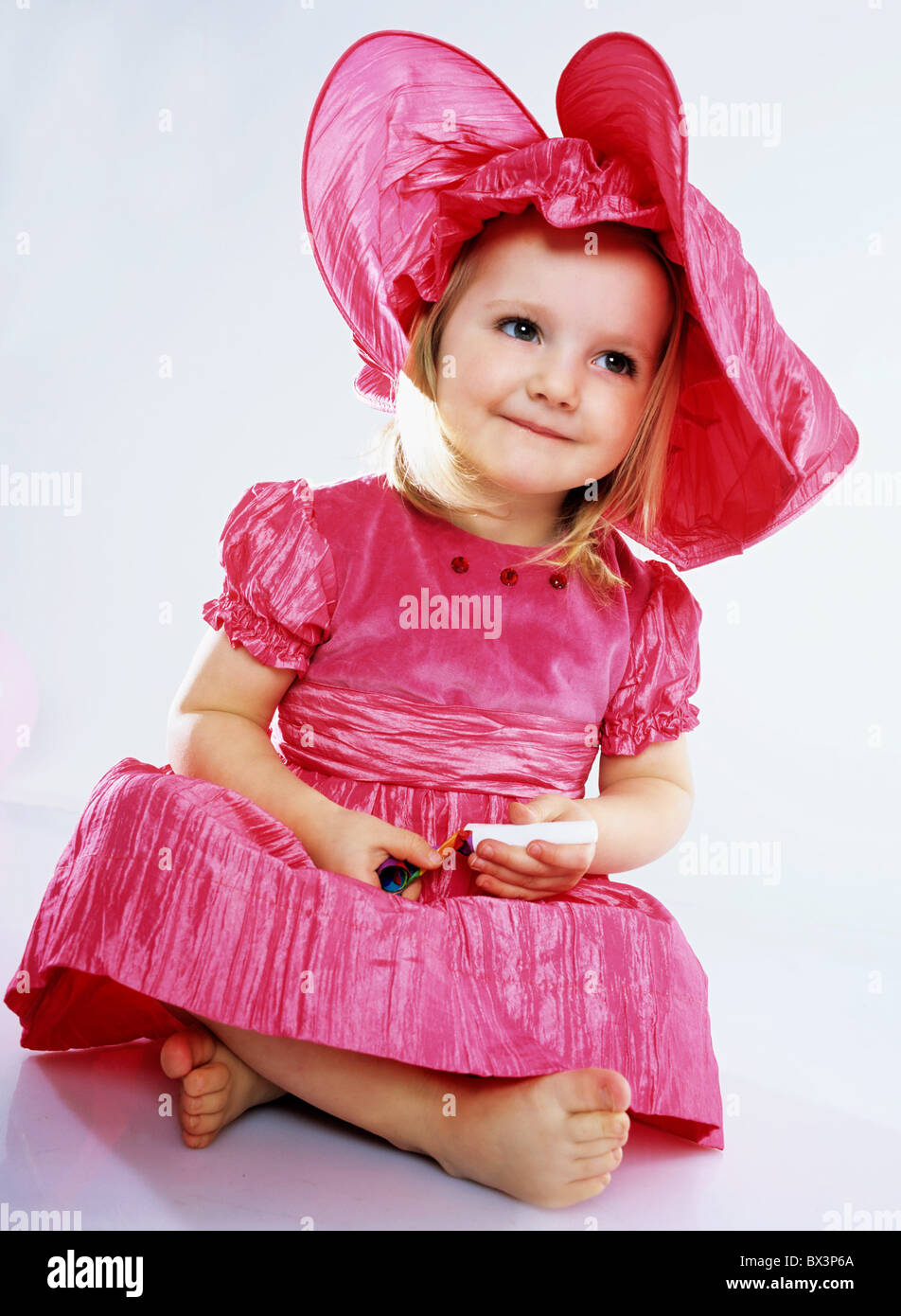 Baby girl wearing disguise indoors Stock Photo - Alamy